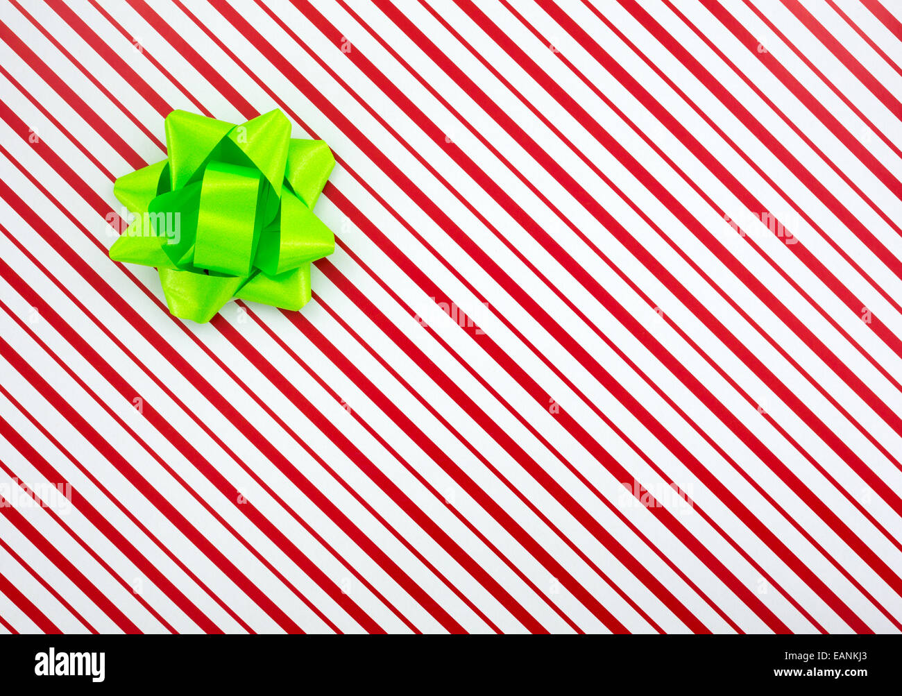 Top view of a Christmas design red and white striped box with a green ...