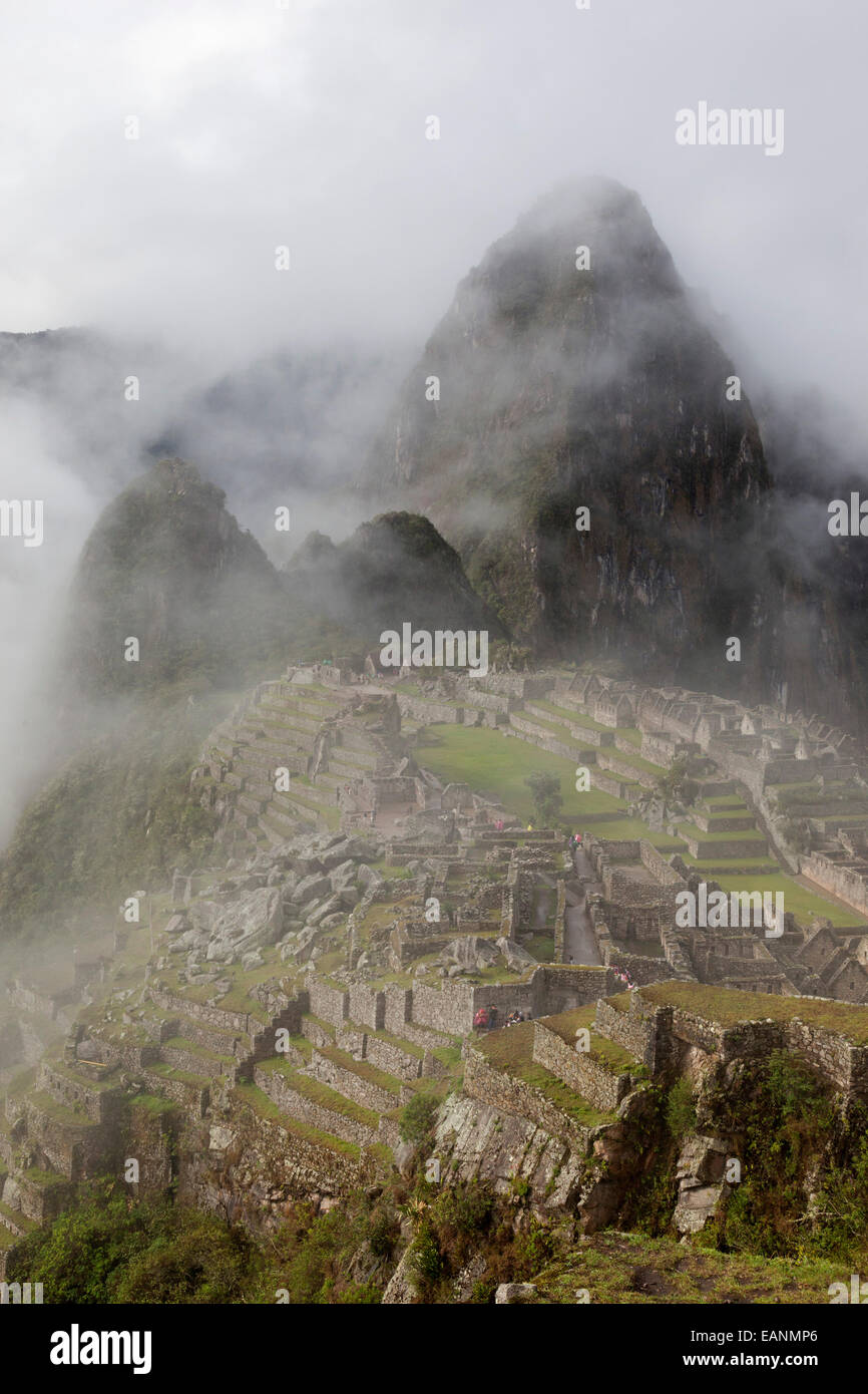 Machu Picchu during the rainy season with clouds and mist, near Aguas ...