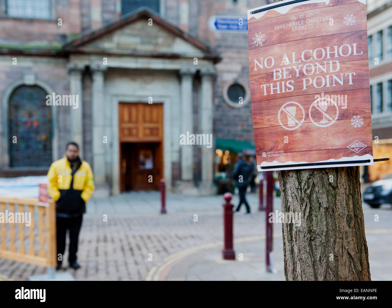 Security guard ensuring no alcohol enters the banned drinking street ...