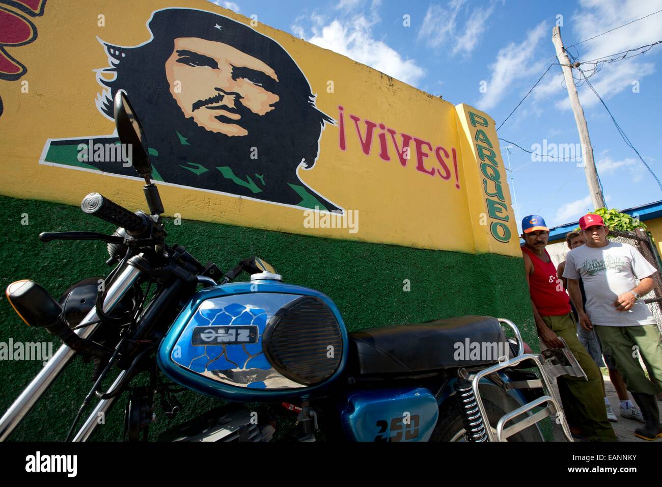 Havana, Cuba. 12th Nov, 2014. An MZ motorcycle in front of a picture of ...