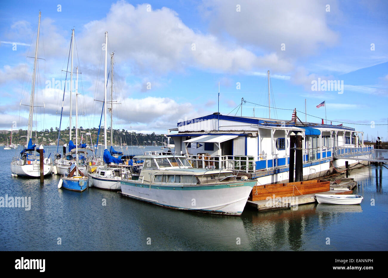 old world war II barge serving as a converted yacht club in Sausalito ...