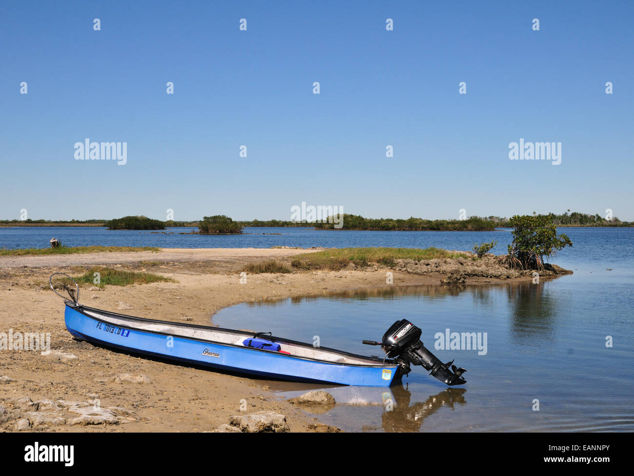 Small boat outfitted for fishing at a beach in the Crystal River area ...