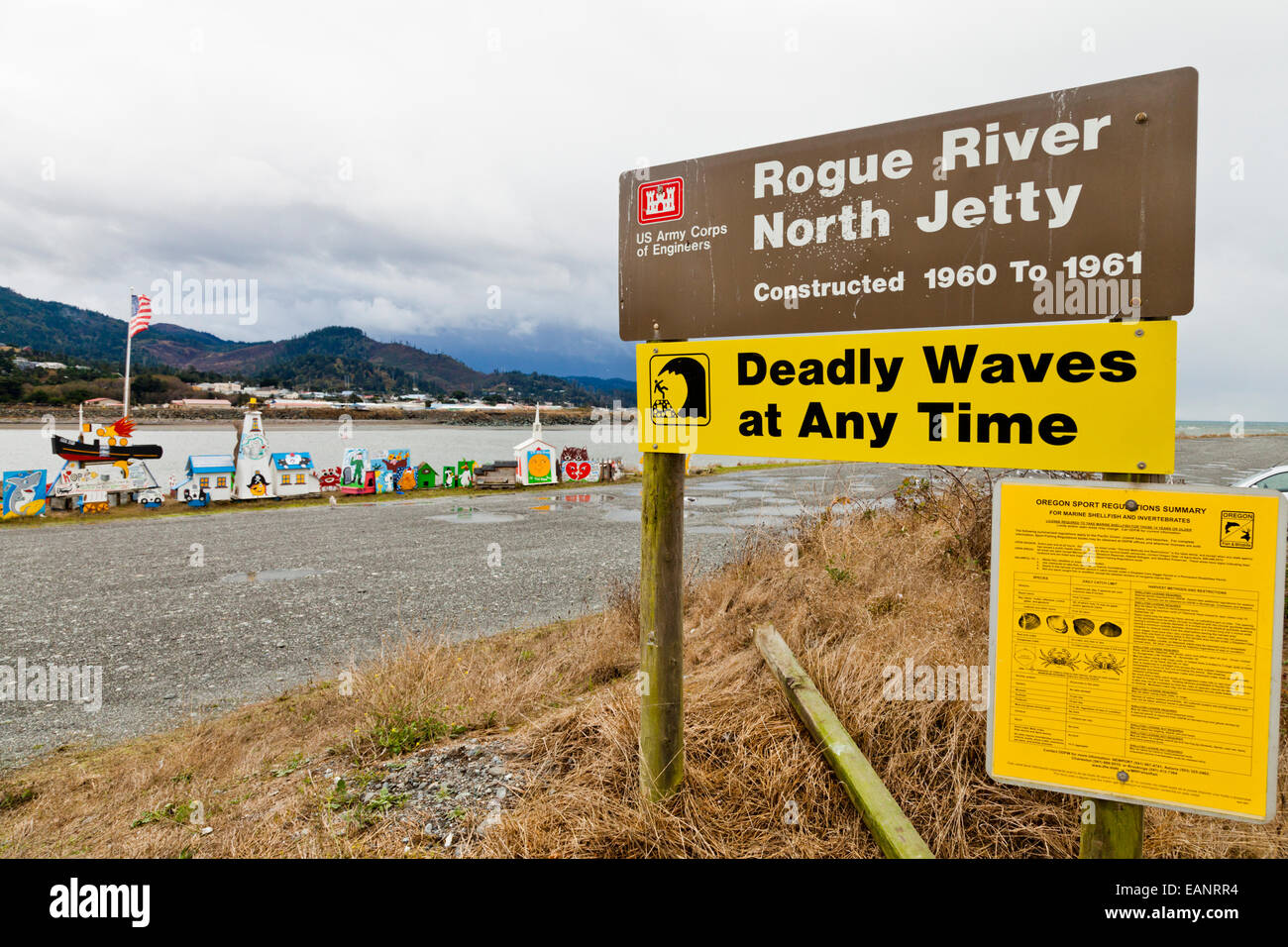 Rogue River North Jetty sign with Fort Feline in the background Stock ...