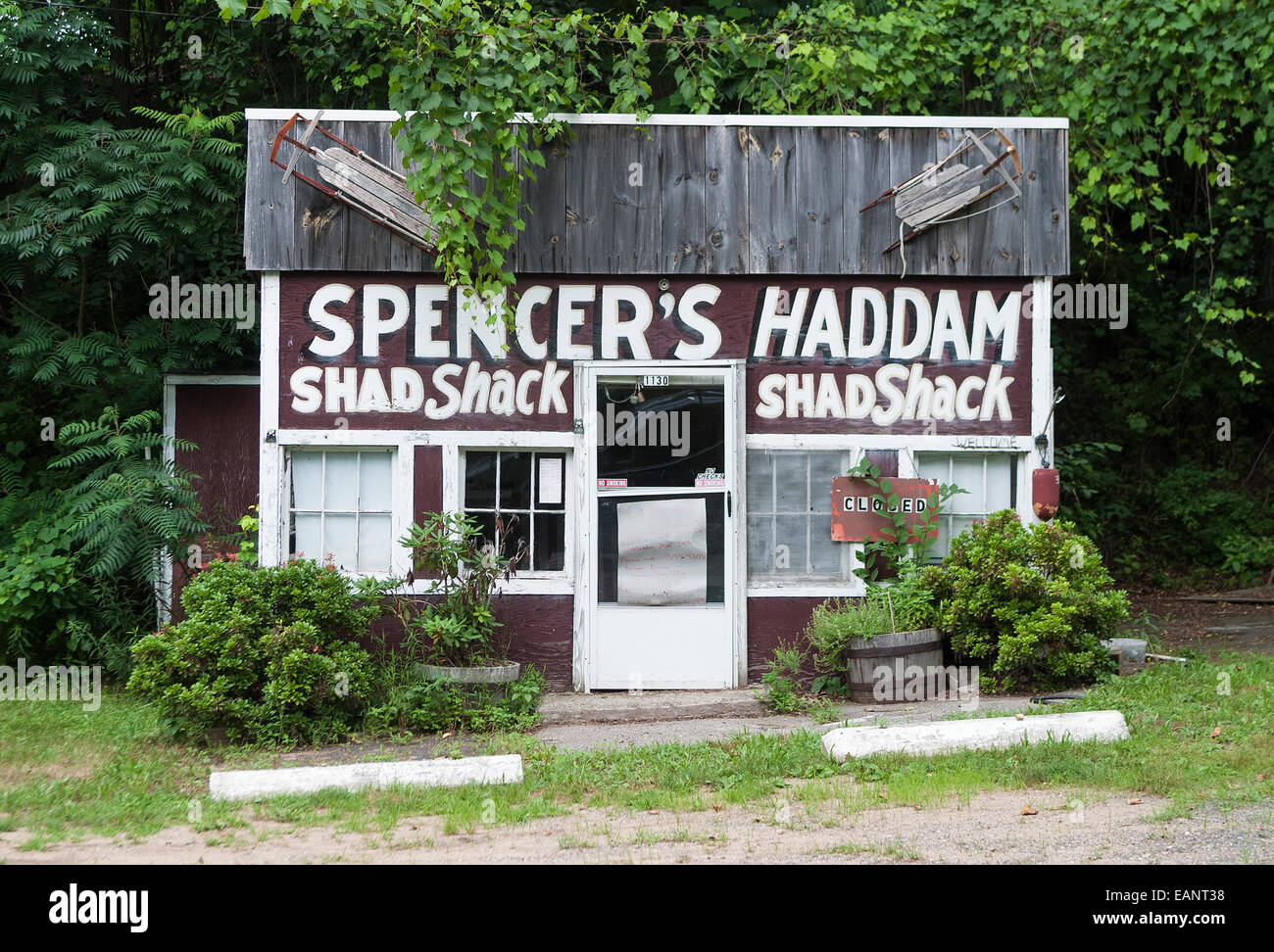 Classic Connecticut shad shack with sleds for facade decoration closed ...