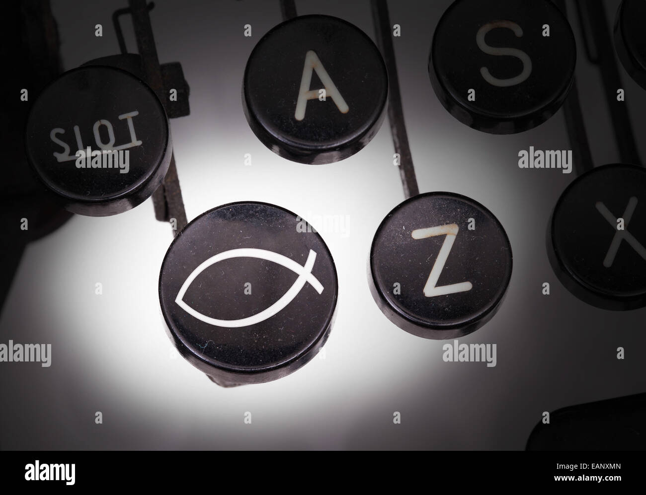 Typewriter with special buttons, Christian fish symbol Stock Photo - Alamy