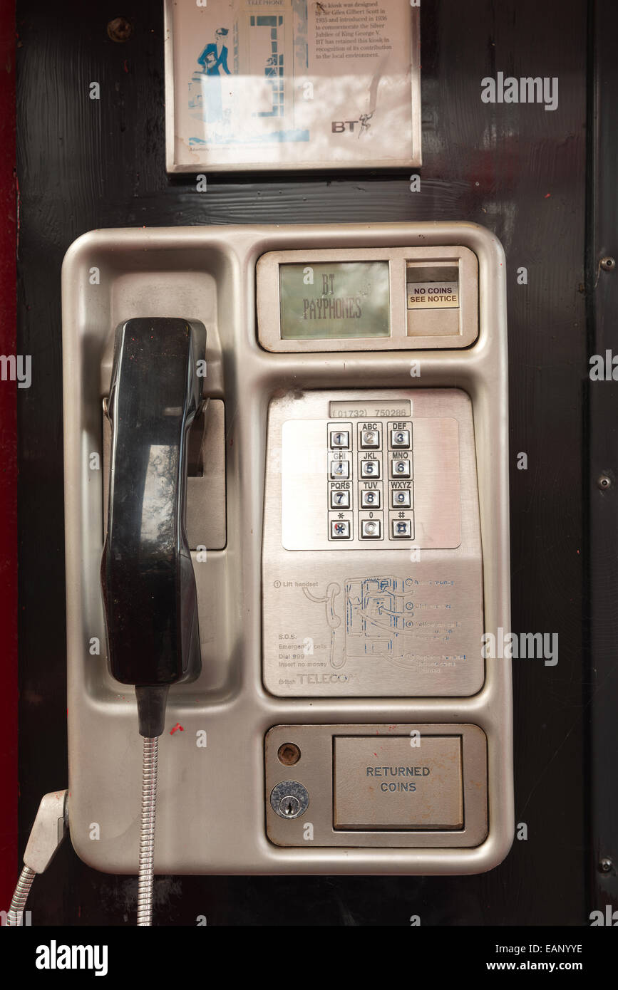traditional old fashioned unused red telephone box illustrating ...