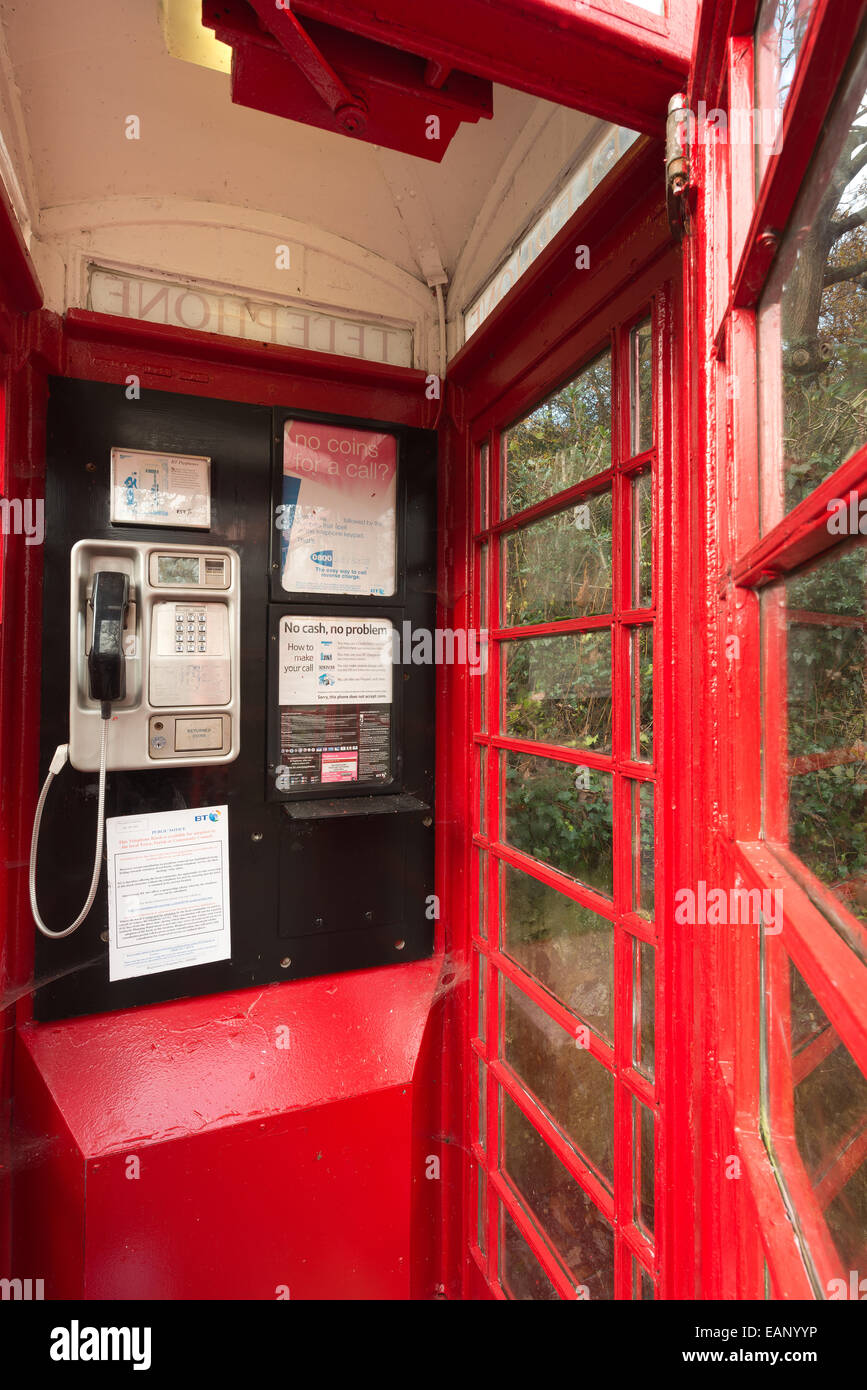 traditional old fashioned unused red telephone box illustrating ...