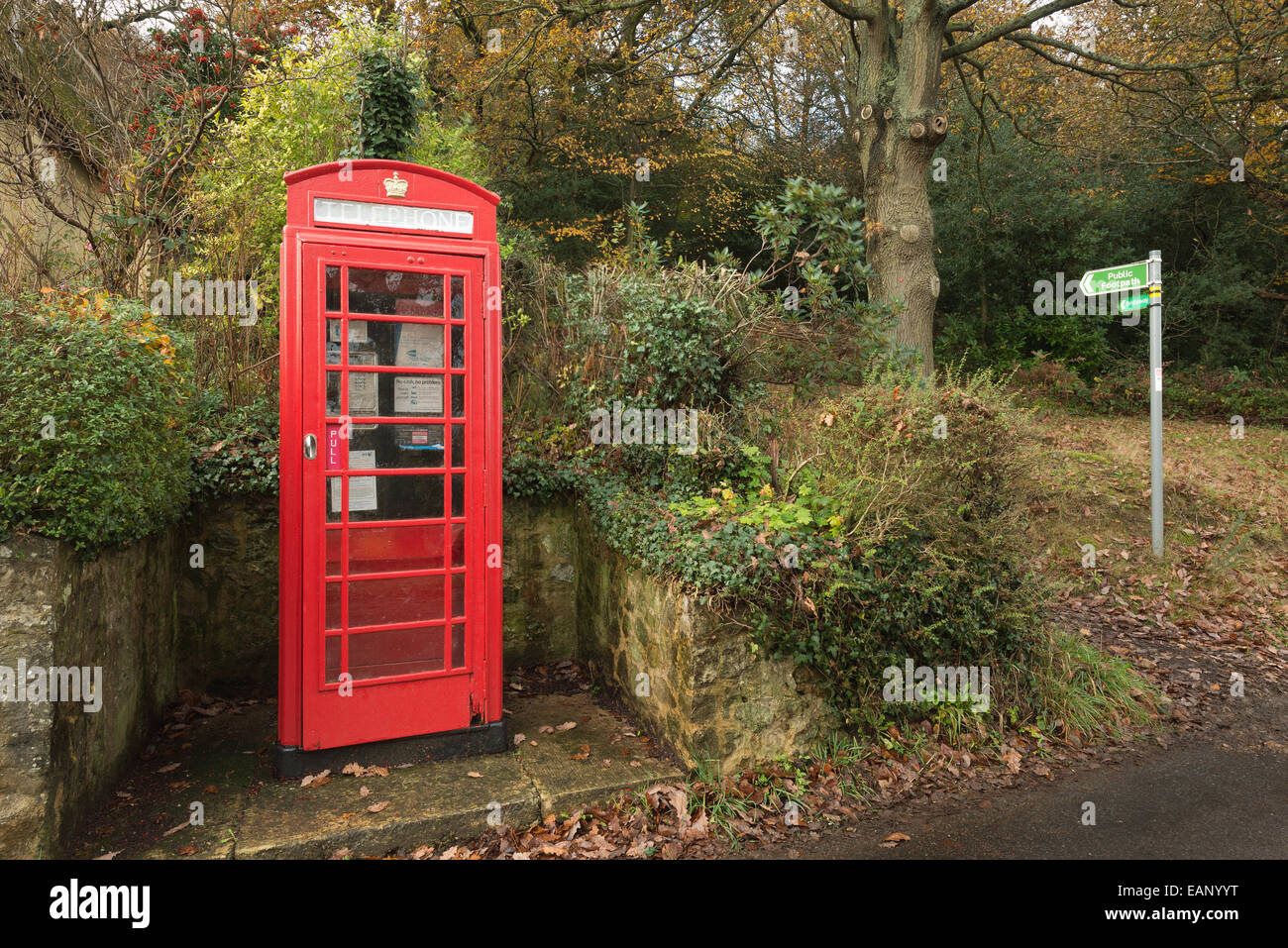 traditional old fashioned unused red telephone box illustrating ...