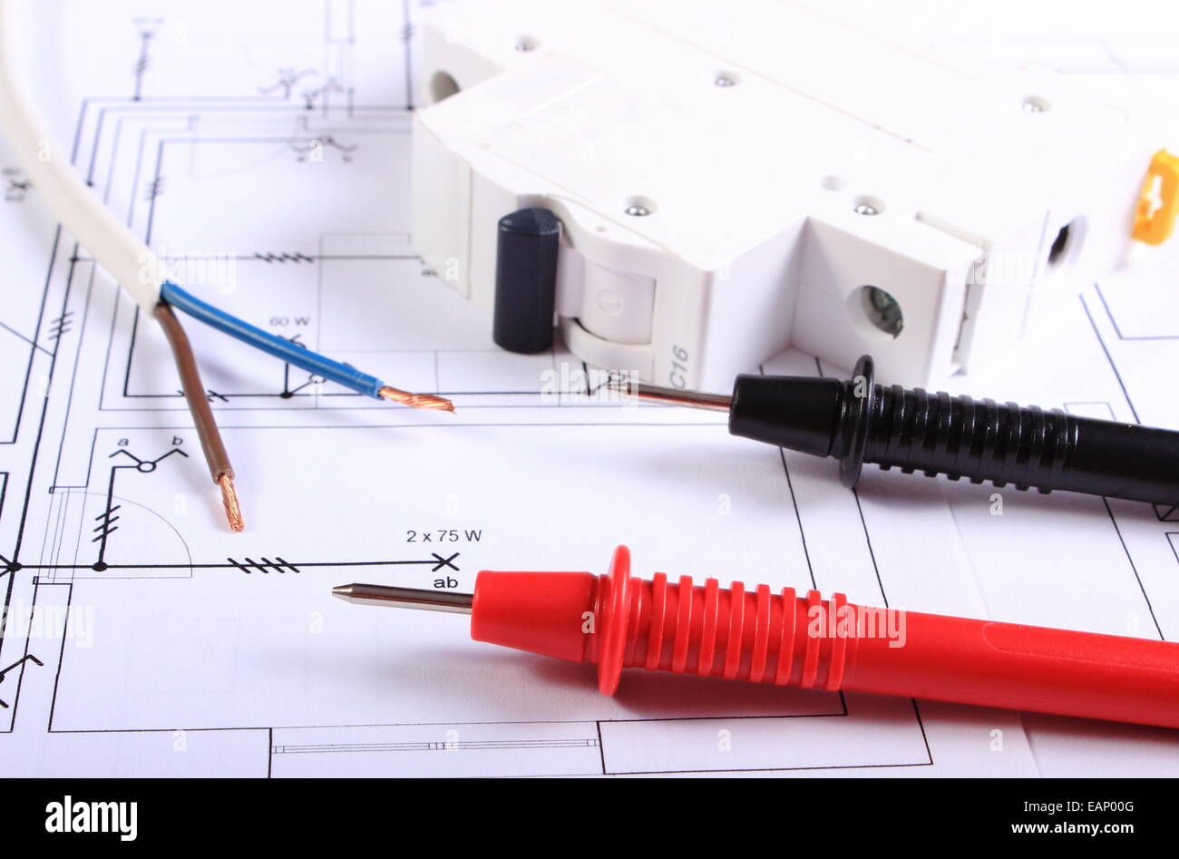 Cables of multimeter, electric wire and electric fuse on construction ...