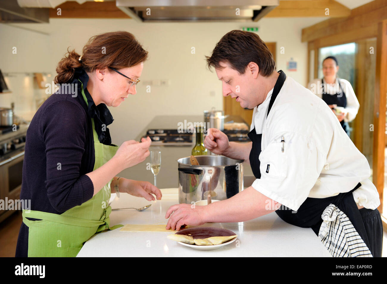Learning how to fold samosas with chef James Graham during a chicken ...
