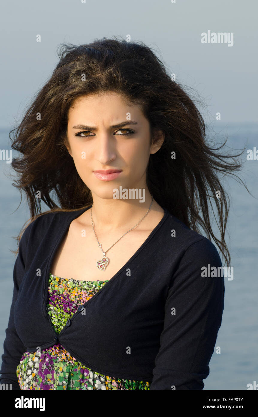 Serious Middle eastern girl outdoors Stock Photo - Alamy