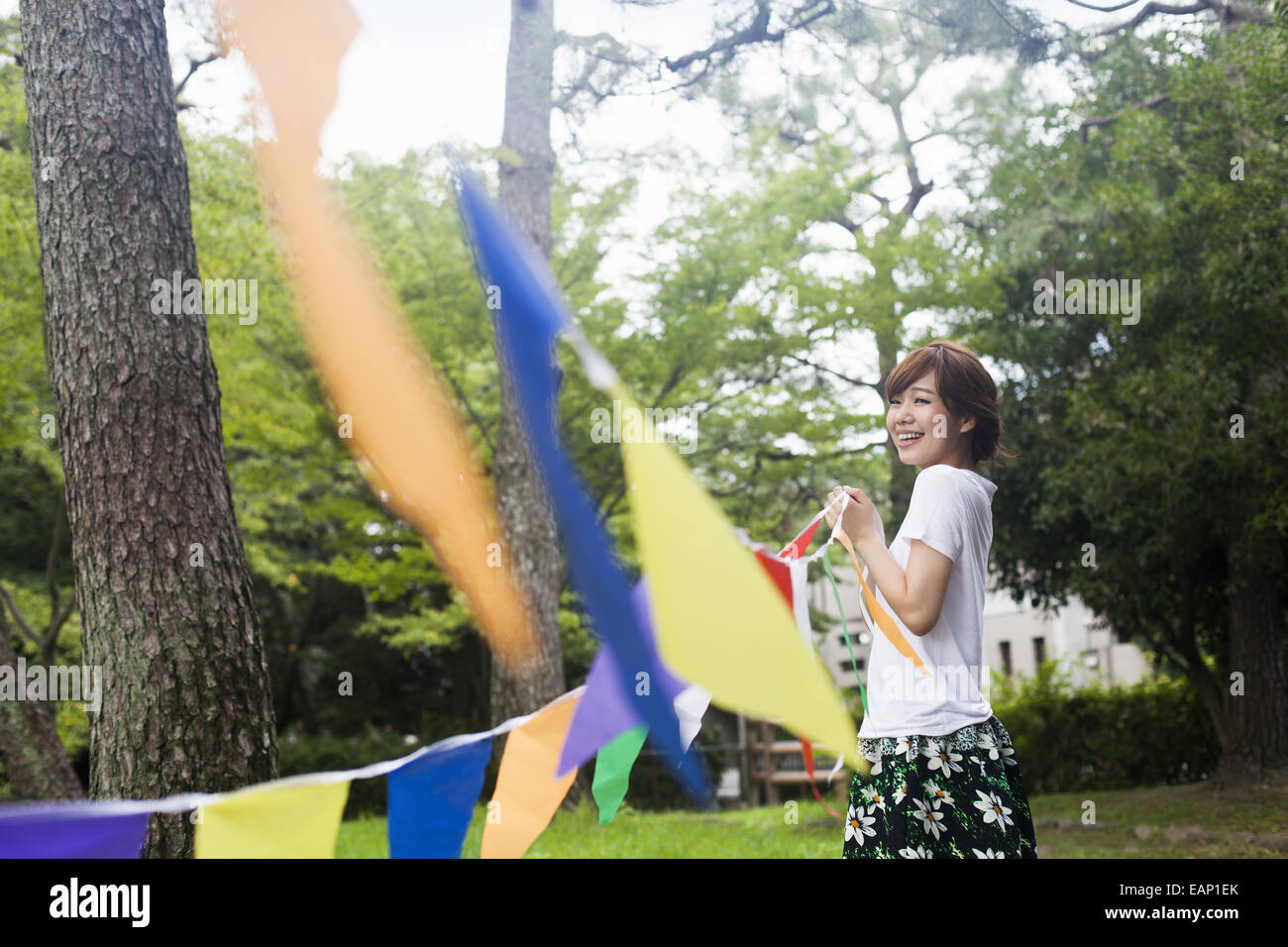 Woman up in a tree hi-res stock photography and images - Alamy