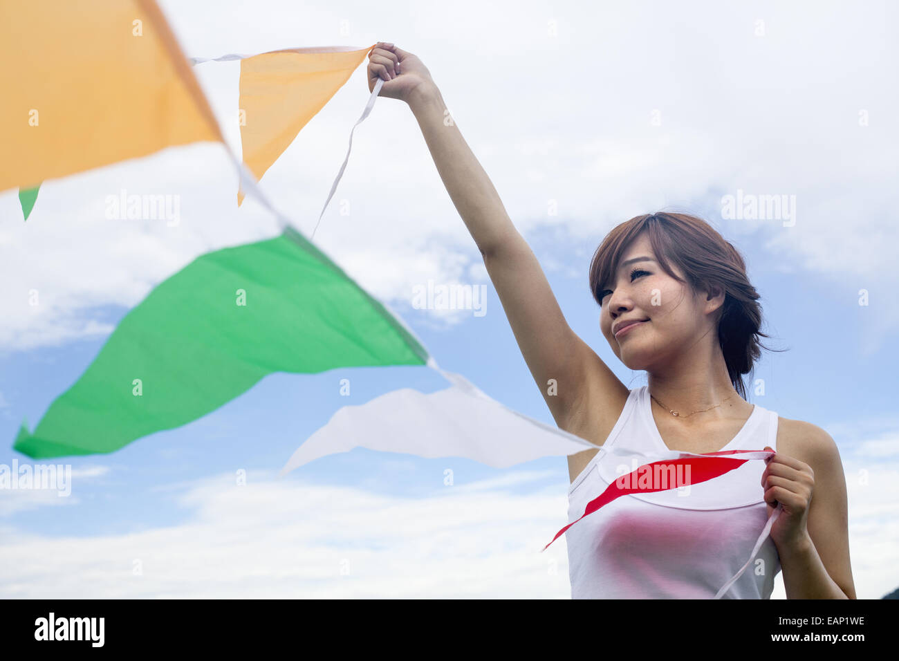 Women holding flags hi-res stock photography and images - Alamy