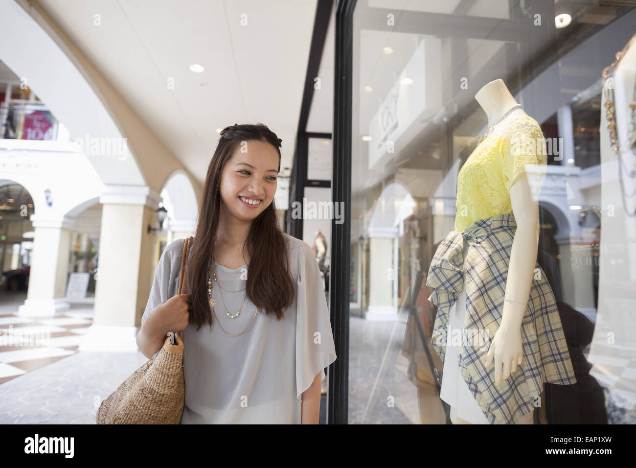 Young woman on a shopping trip Stock Photo - Alamy