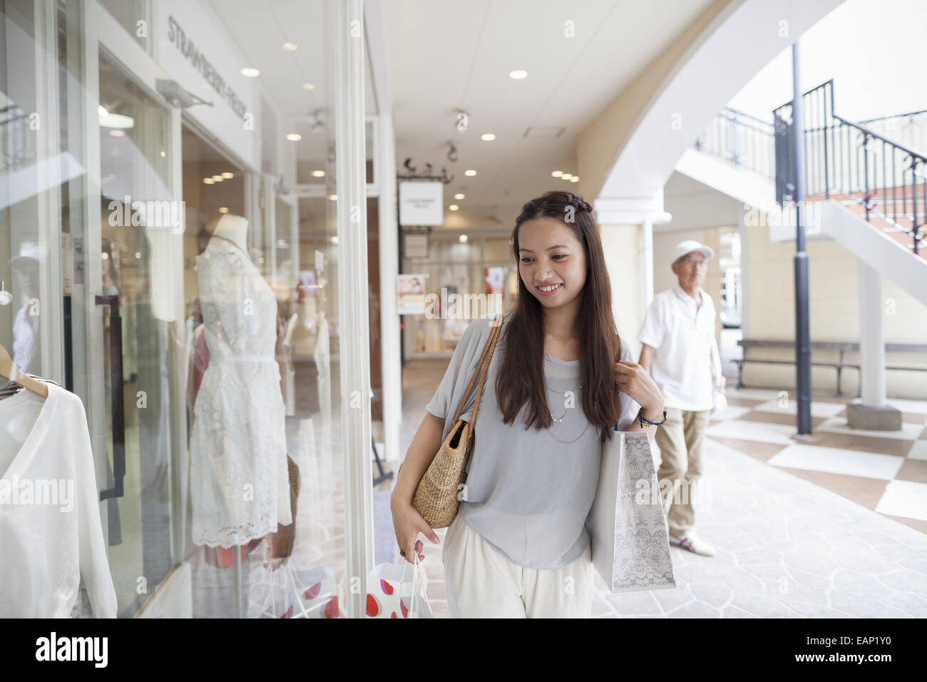Young woman on a shopping trip Stock Photo - Alamy