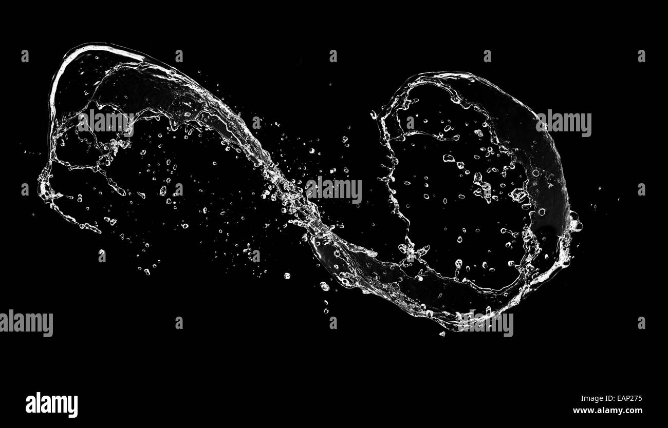 Wavy splash, isolated on black background Stock Photo - Alamy
