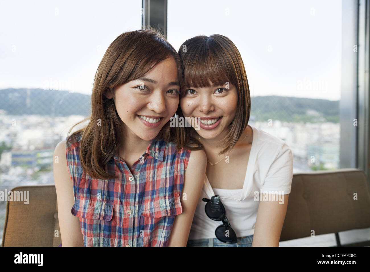 Friends together at home Stock Photo - Alamy