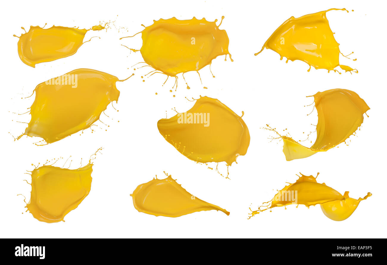 Shot of yellow paint splashes, isolated on white background Stock Photo ...