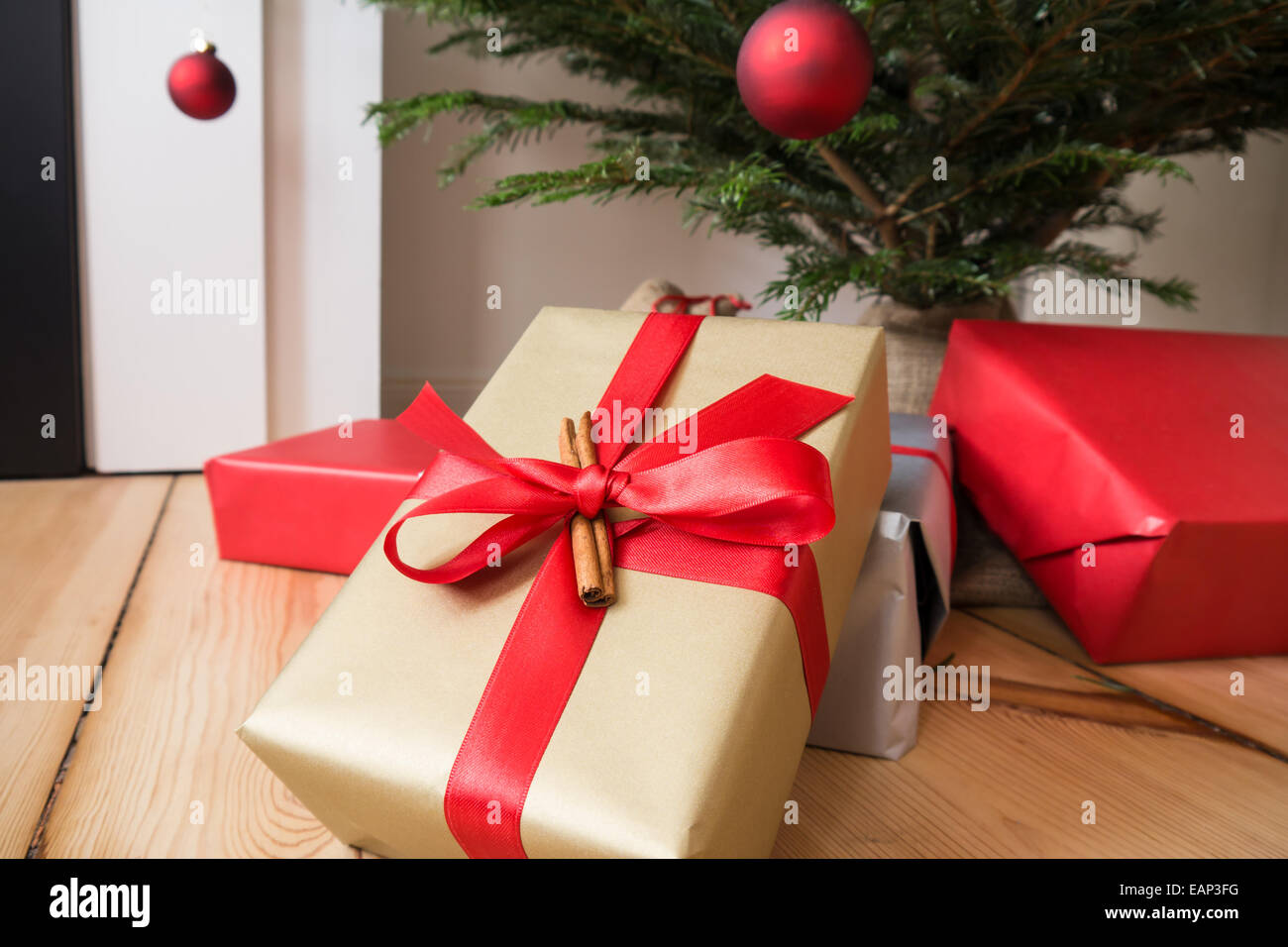 presents and christmas tree on timber piling Stock Photo - Alamy