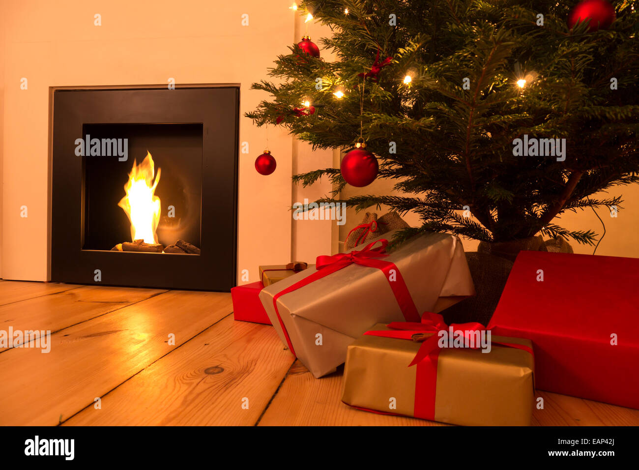 chimney and christmas tree and timber piling Stock Photo - Alamy