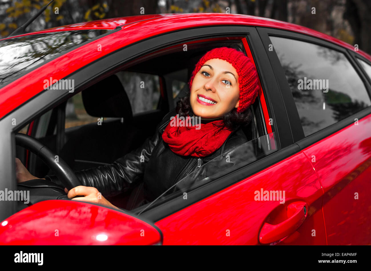 Women in red and car hi-res stock photography and images - Alamy