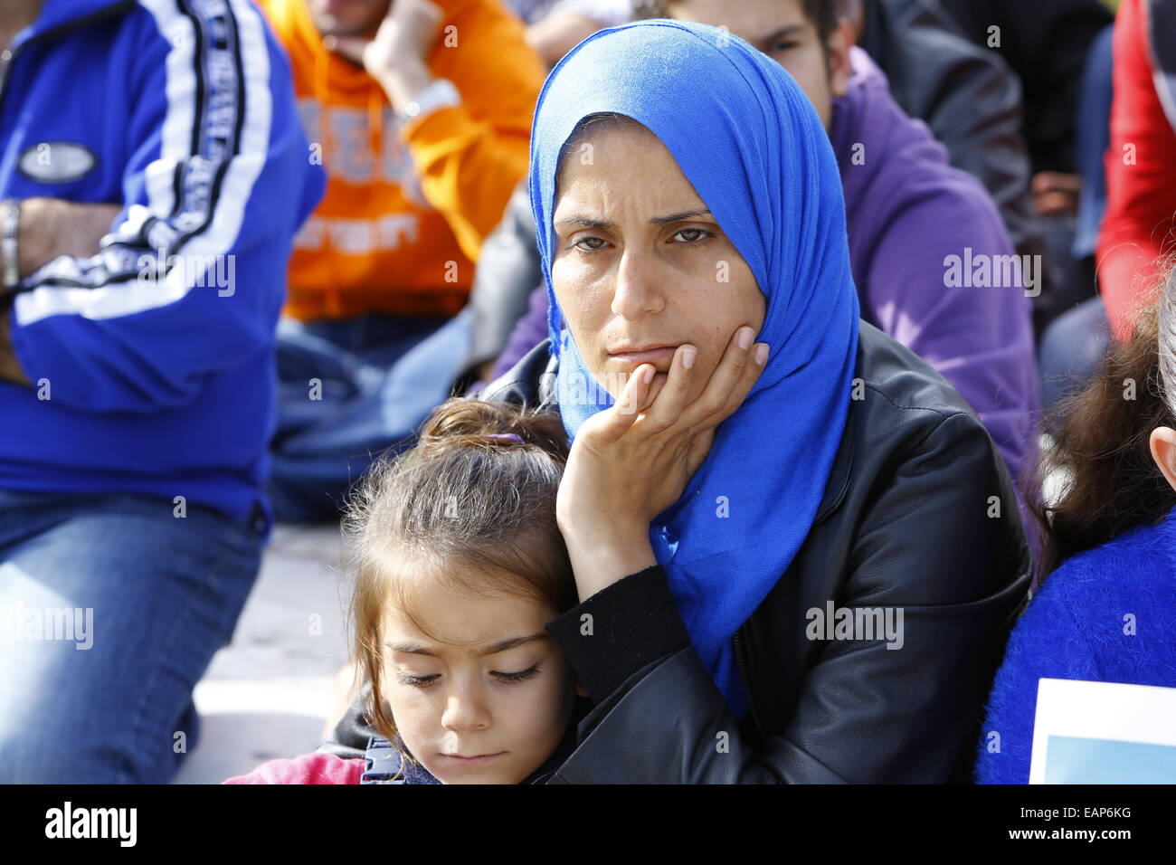 Athens, Greece. 19th November 2014. A Syrian mother holds her daughter ...