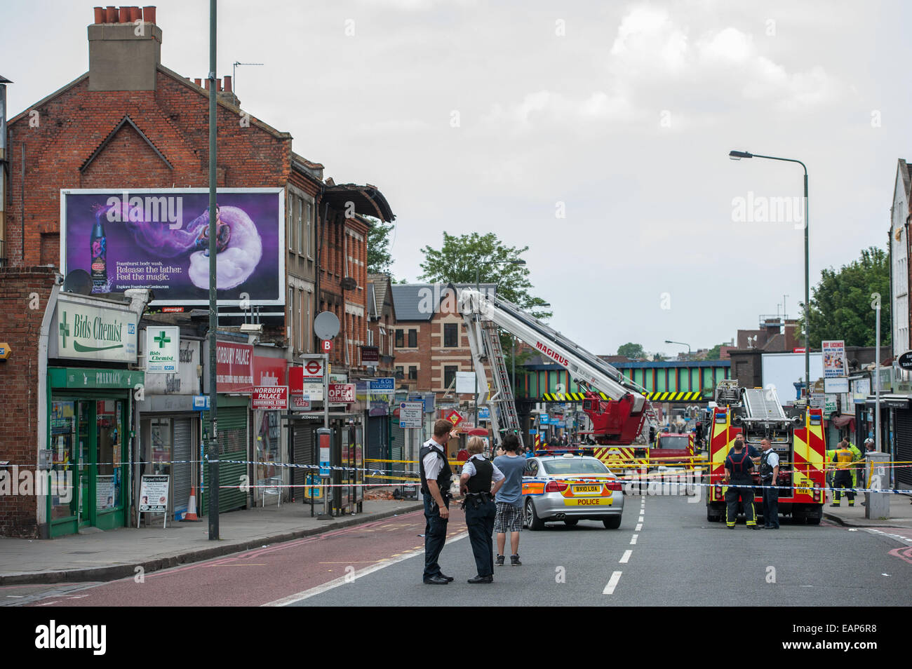 Emergency services dealing with the building collapse on the London ...