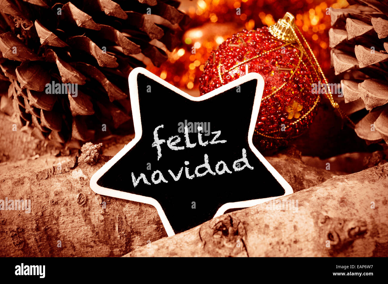 the text feliz navidad, merry christmas written in spanish in a star ...