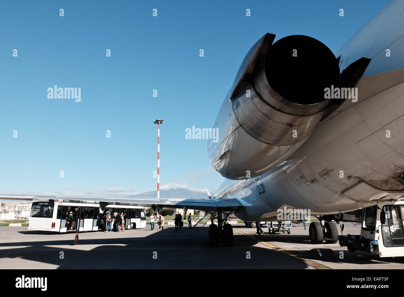 Tourists disembark from an Air Bulgaria chartered McDonnell Douglas ...