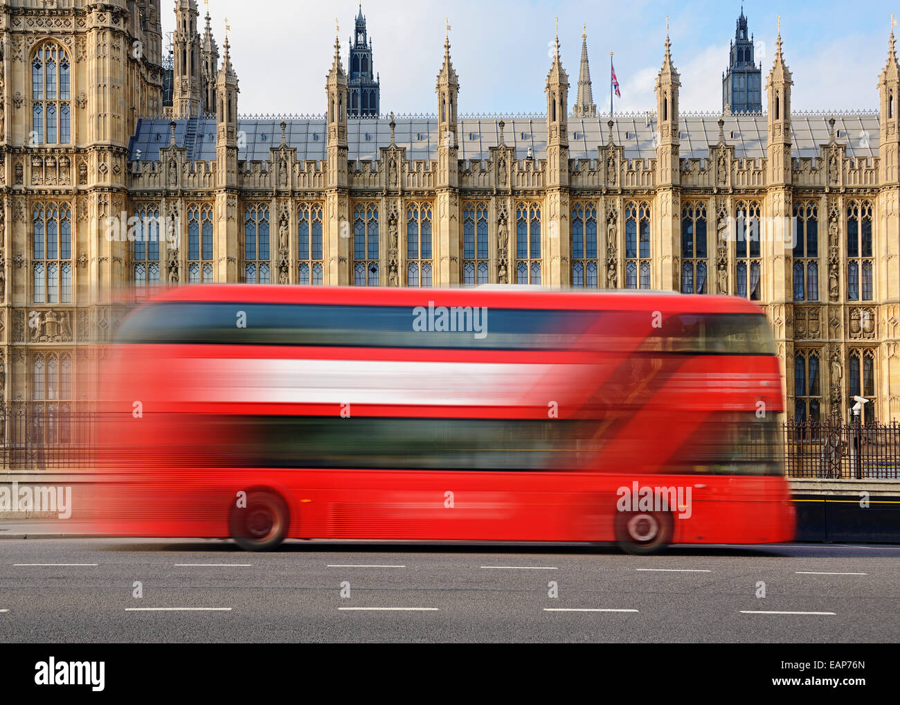 London Bus Going Past the Houses of Parliament, Westminster, London, UK ...