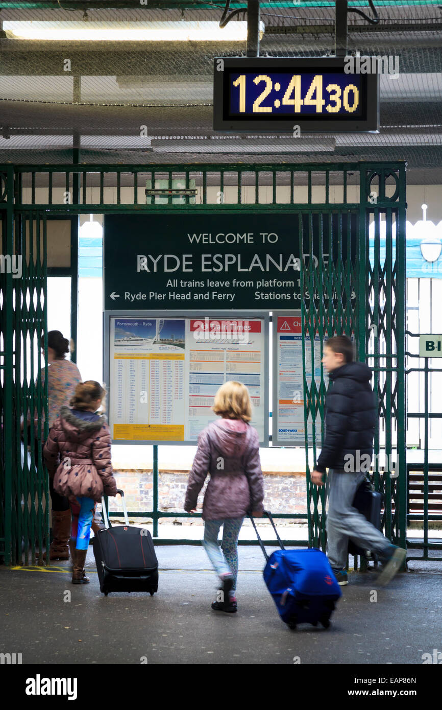 A family enters the Ryde Pier train station on the Isle of Wight Stock ...