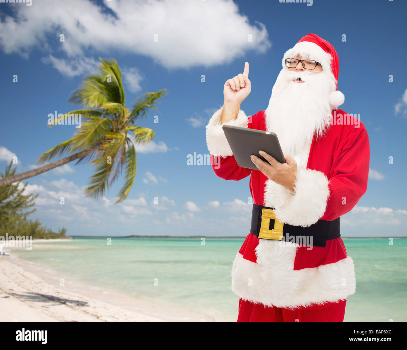 man in costume of santa claus with tablet pc Stock Photo - Alamy