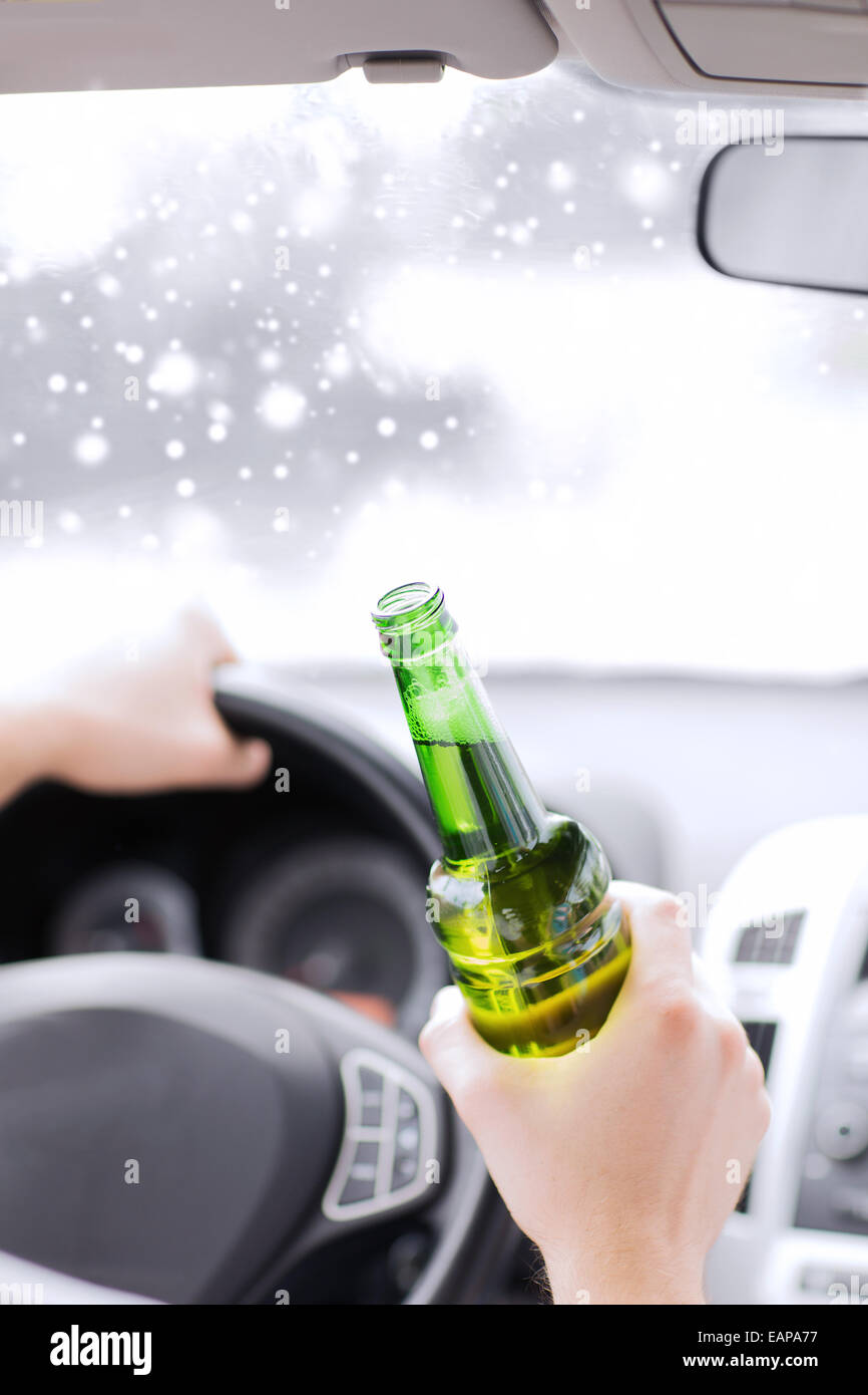 close up of man drinking alcohol while driving car Stock Photo - Alamy