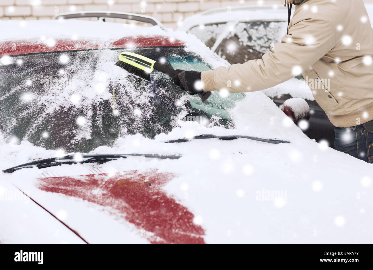 Person wiping snow from car hi-res stock photography and images - Alamy