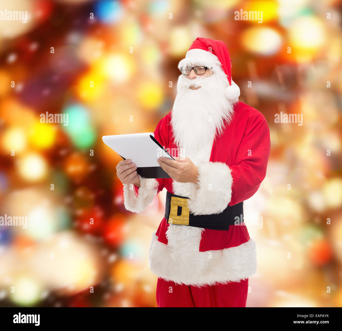 man in costume of santa claus with notepad Stock Photo - Alamy