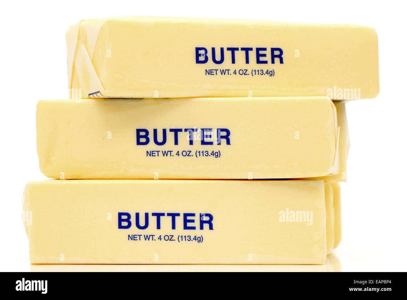 Traditional wrapped butter sticks on white background Stock Photo - Alamy