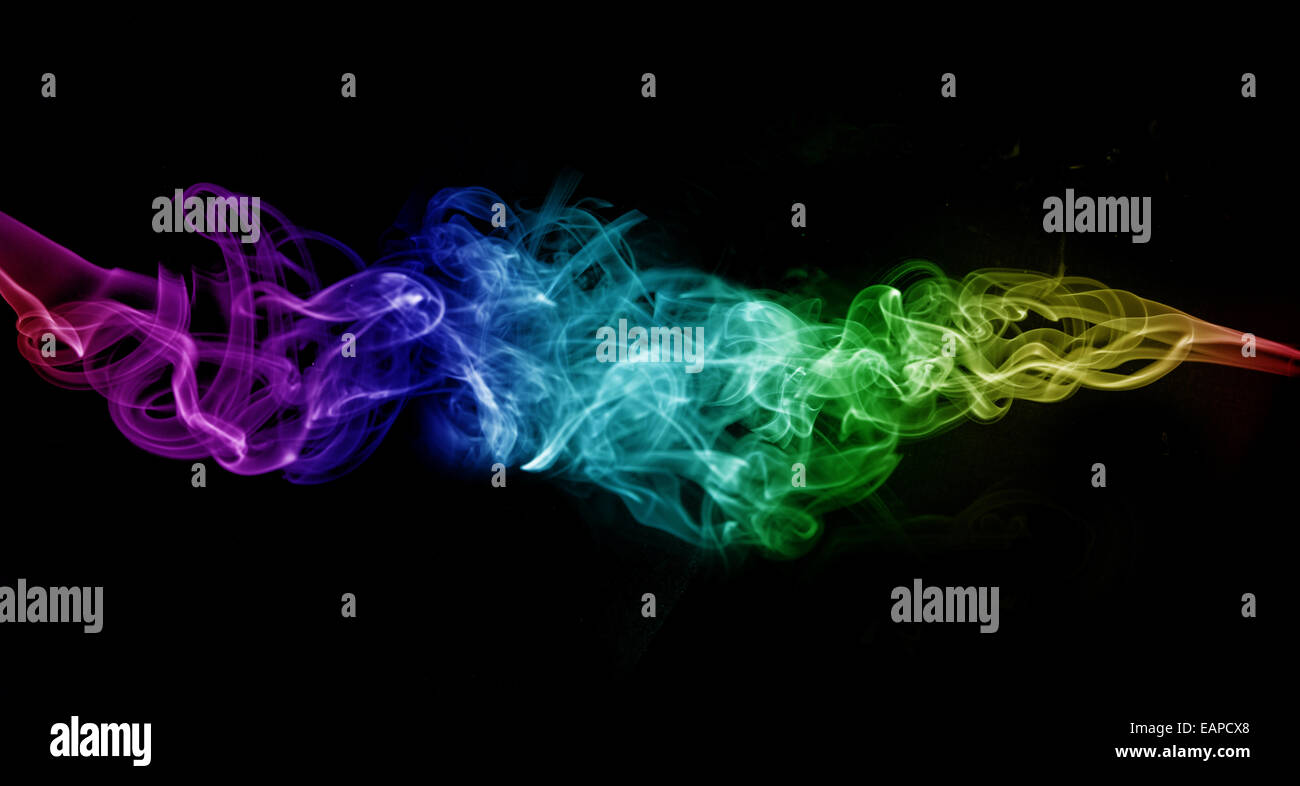 Colored smoke isolated on black background Stock Photo - Alamy