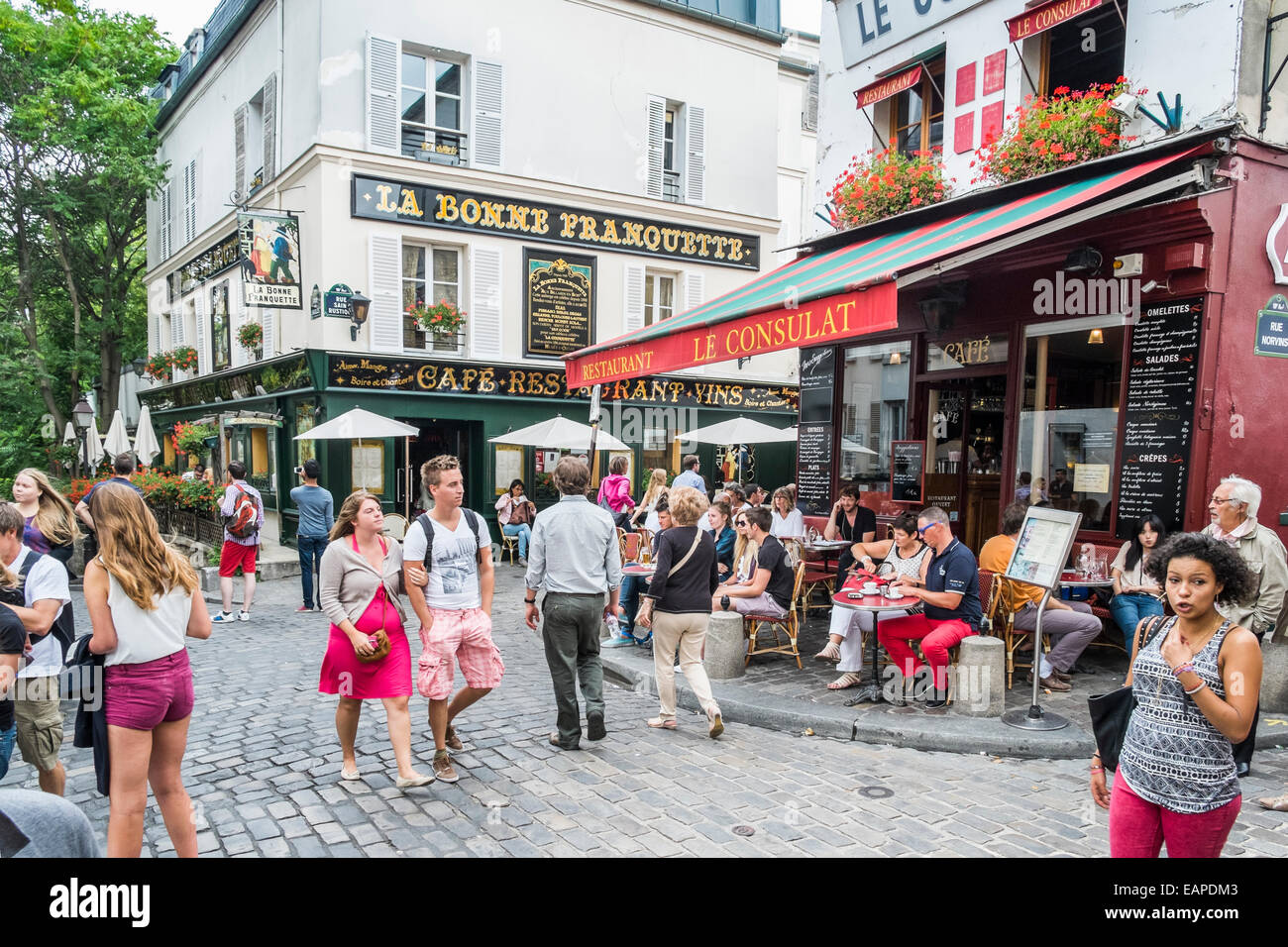 tourists at montmatrre at the corner of rue saint rustique and rue des ...