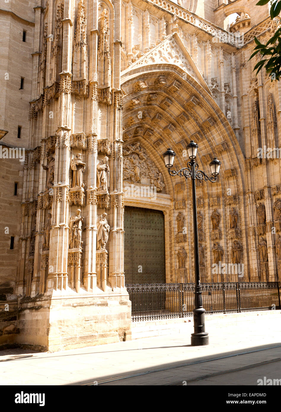Detail of carved stonework of cathedral frontage showing statues of ...