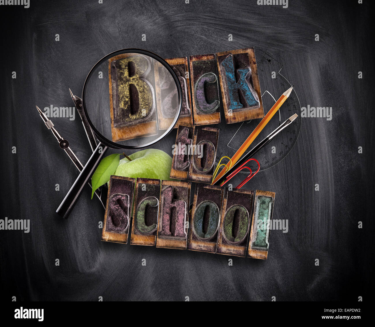 Concept of educational tools with blackboard Stock Photo - Alamy