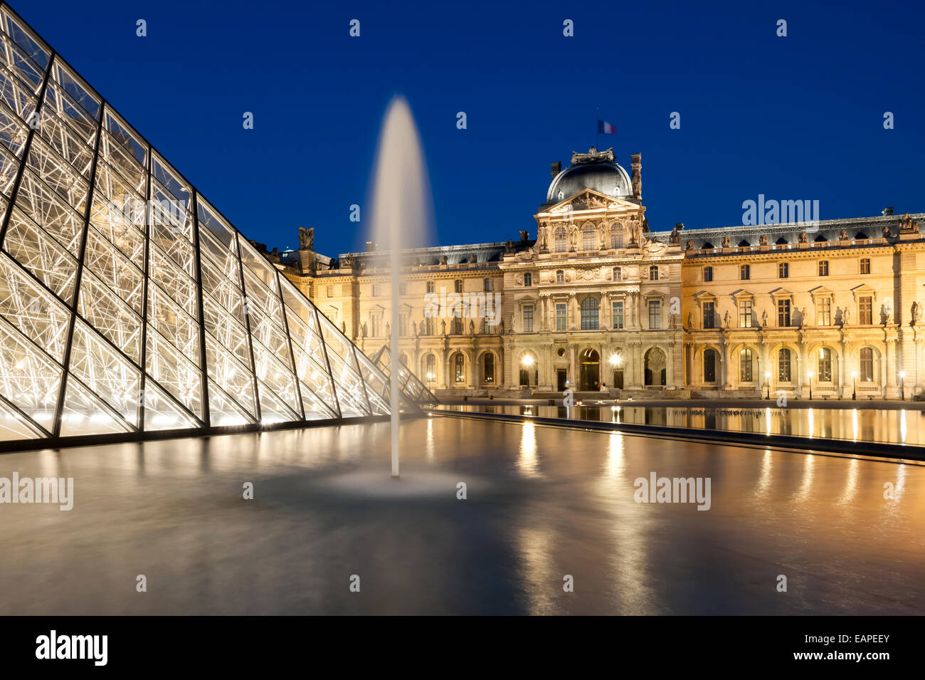Louvre triangle hi-res stock photography and images - Alamy