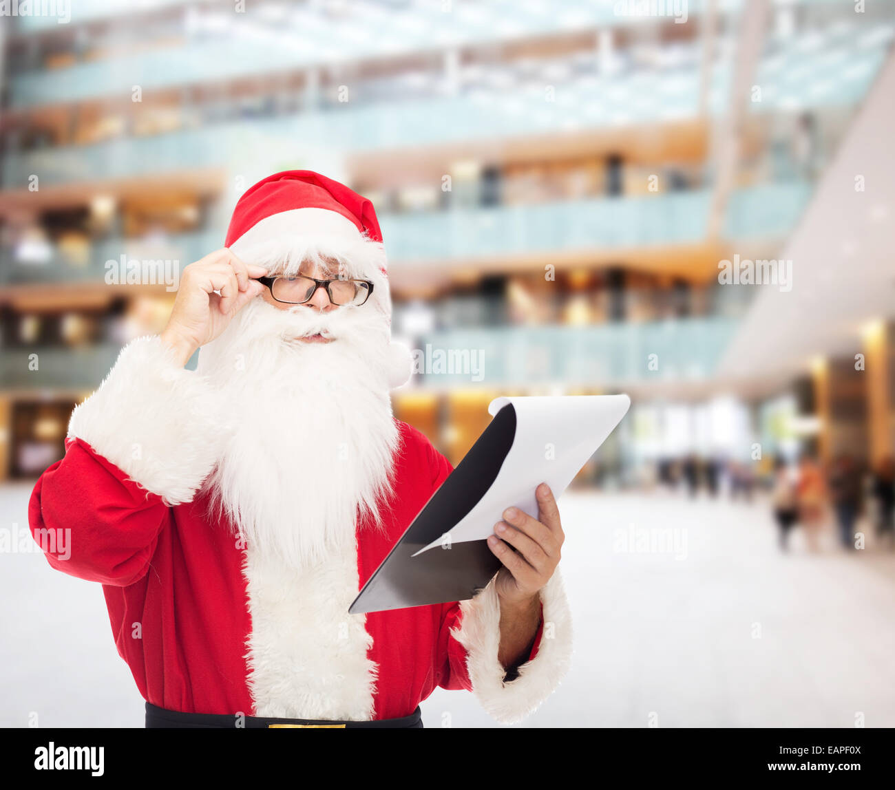 man in costume of santa claus with notepad Stock Photo - Alamy