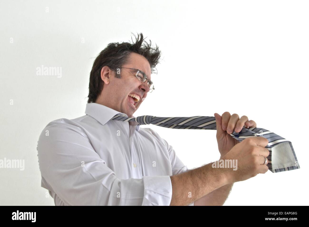 Hispanic happy man singing in the office Stock Photo - Alamy