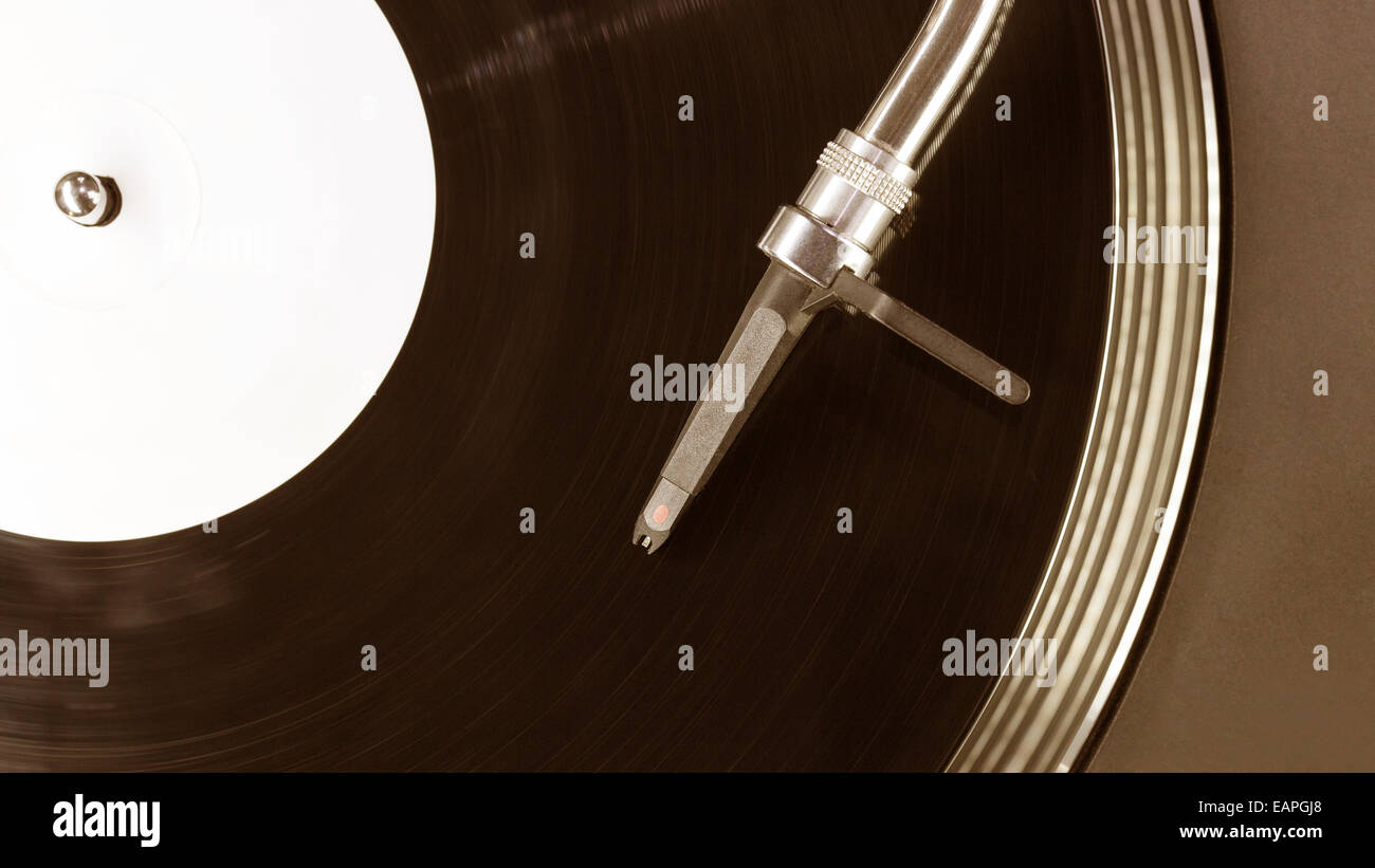Dj needle stylus on spinning record, closeup Stock Photo - Alamy