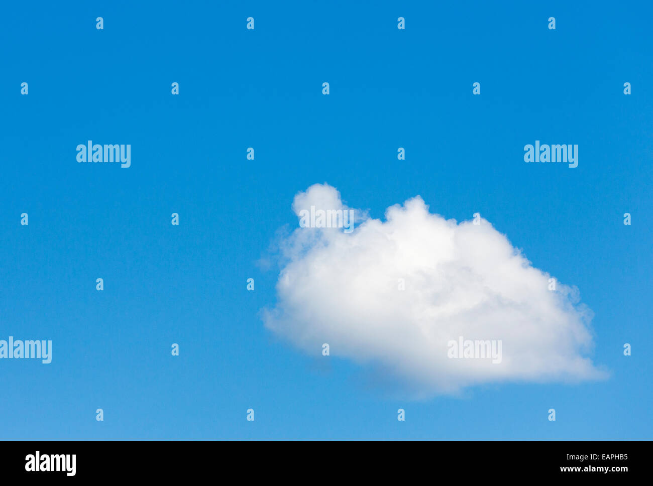 One white cloud on blue sky , Finland Stock Photo - Alamy