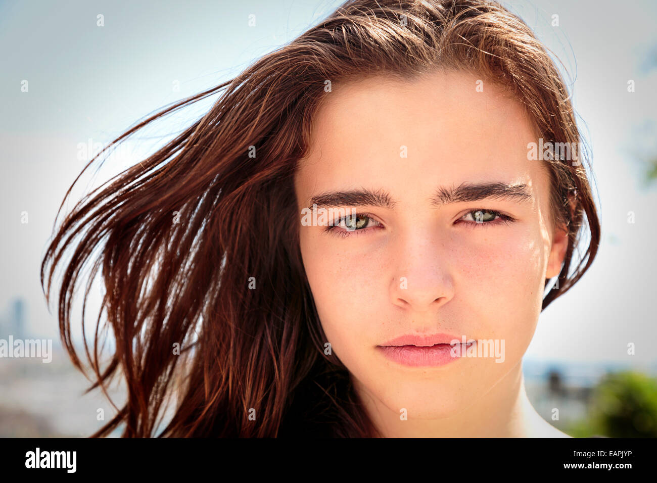 portrait of a beautiful woman with wind in her hair Stock Photo - Alamy