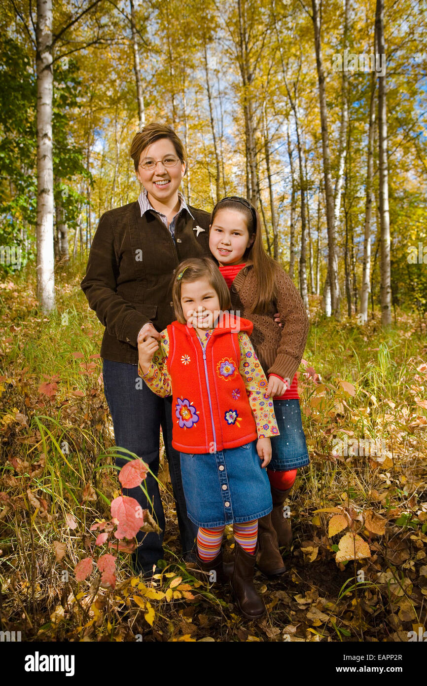 Native Family Standing In Birch Forest During Fall In Southcentral ...