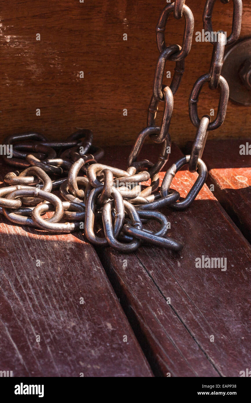 A small chain in a fisherman boat Stock Photo - Alamy