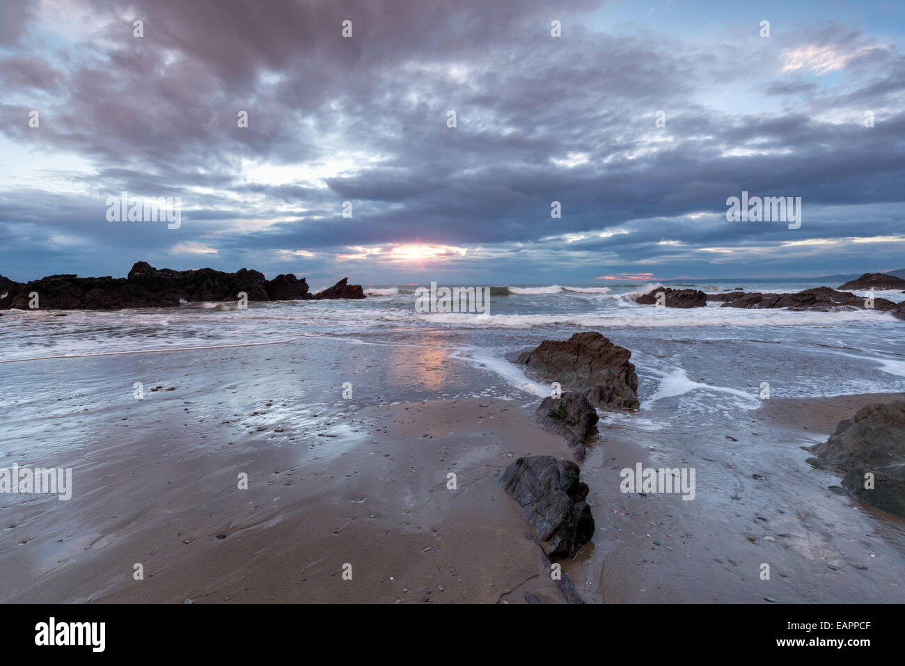 Stormy sunset at Sharrow Beach on Whitsnad Bay in Cornwall Stock Photo ...