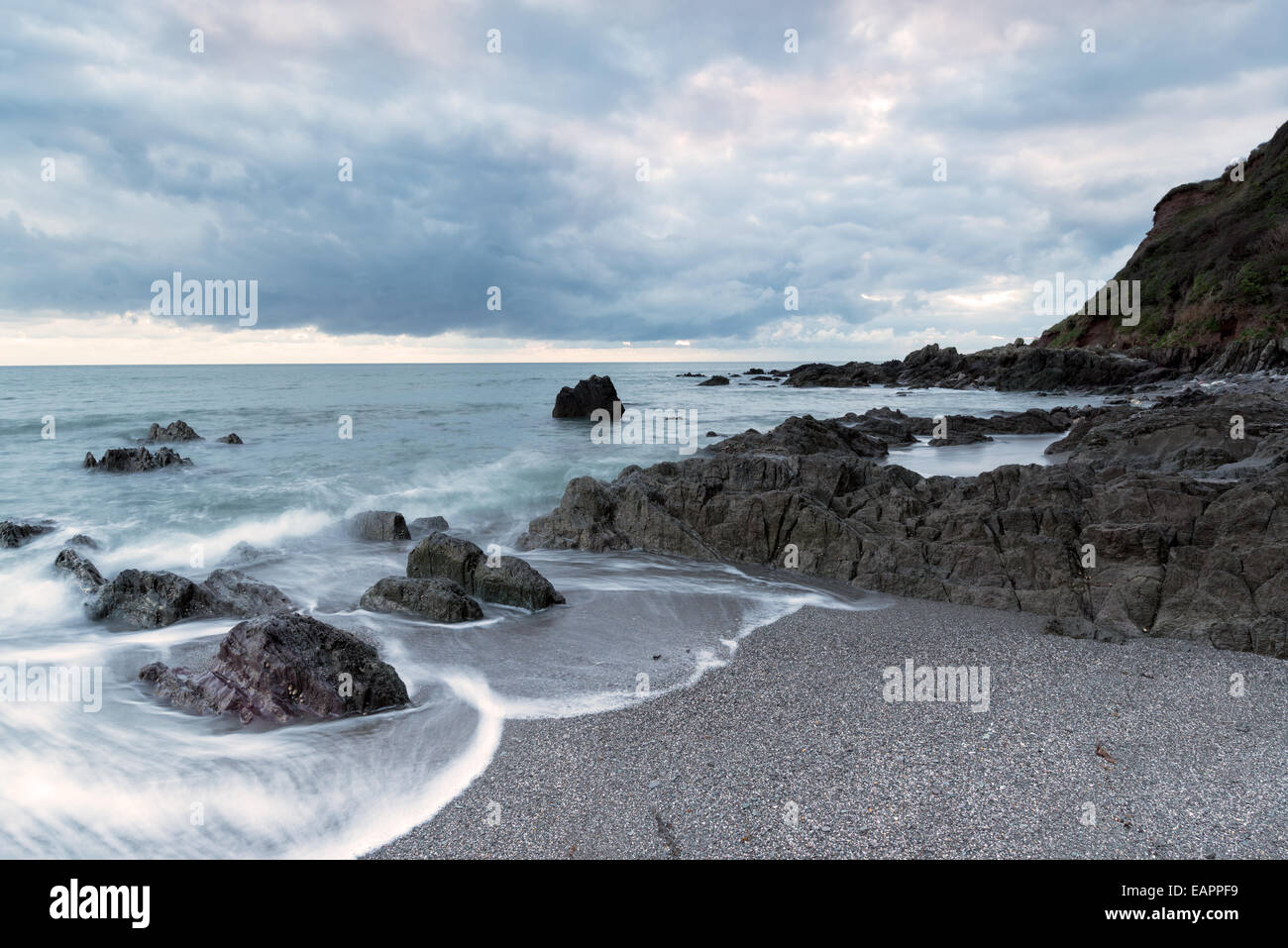 Clouds gather over Portwrinkle in south east Cornwall Stock Photo - Alamy